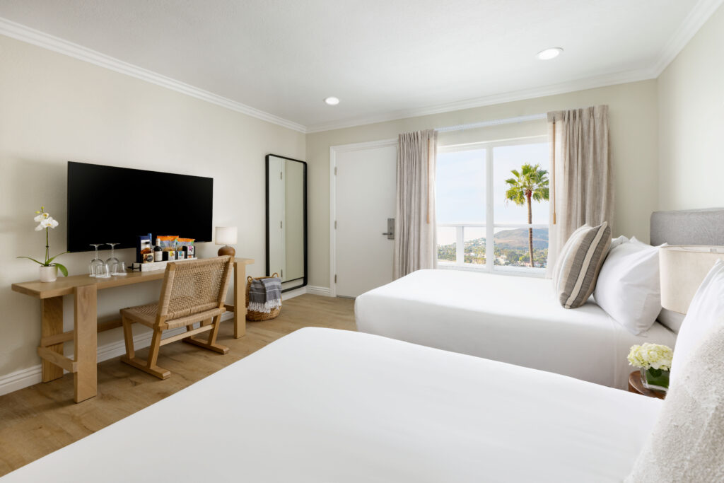 Premier Partial Ocean View Two Double Beds | Pacific Edge